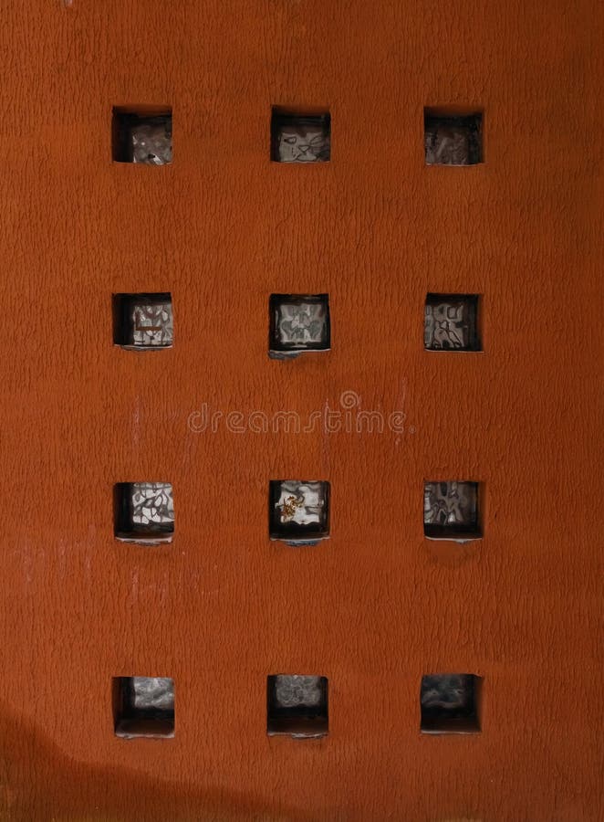 Orange Wall with Rustic Texture with Several Square Holes Pattern Stock ...