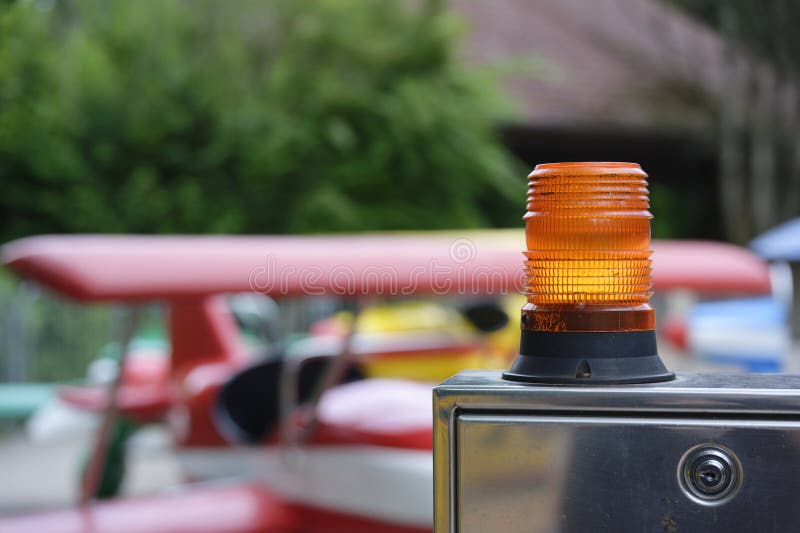 Orange Warning Lamp on Metal Box Near Children Helicopter Rides Stock ...