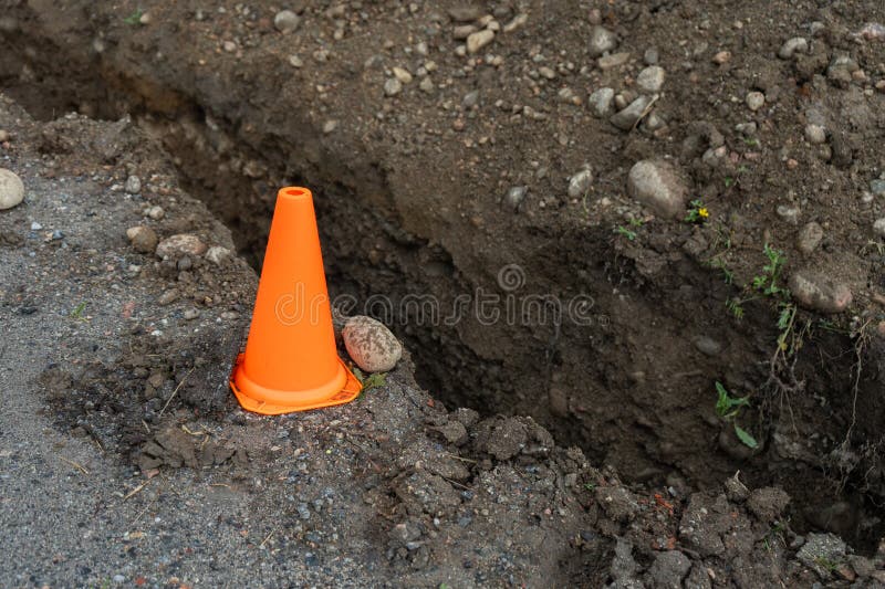 Orange Warning Triangle on the Construction Site - Safety and Hazard ...