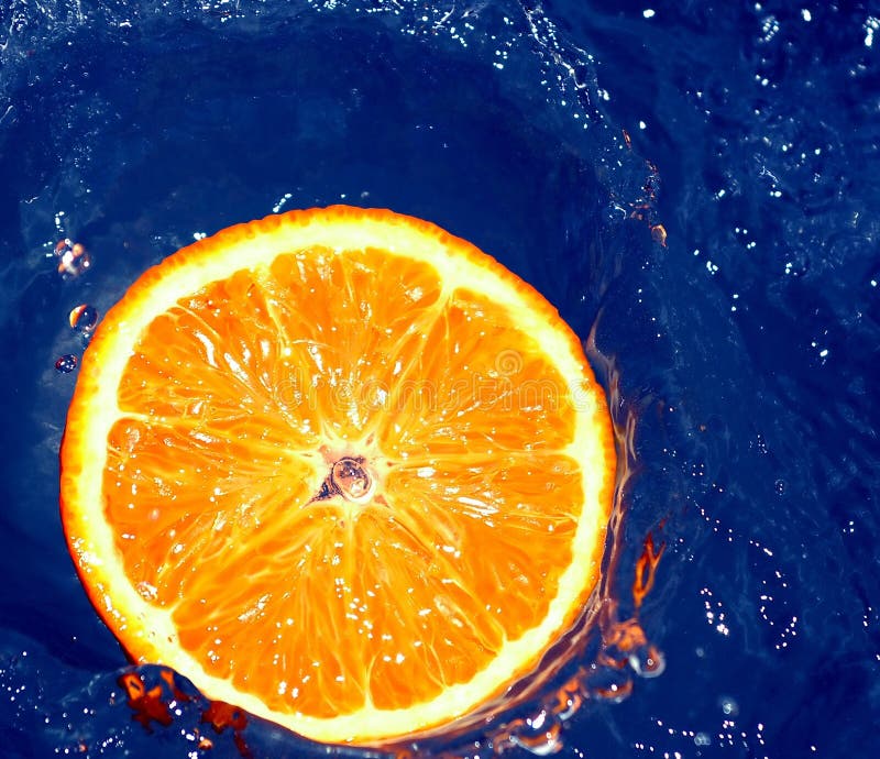 Orange in water stock image. Image of liquid, object, texture - 658161