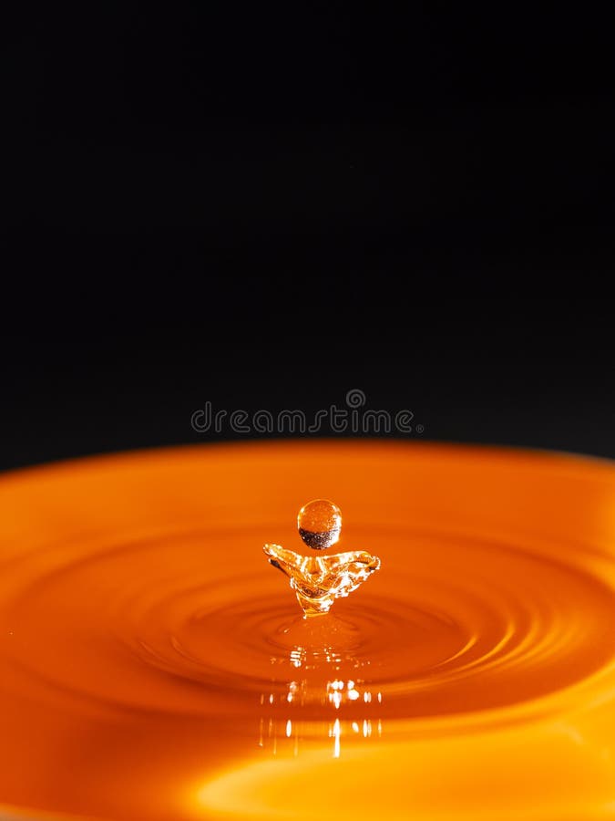 Orange Water Drop with Black Background Stock Photo - Image of drop ...