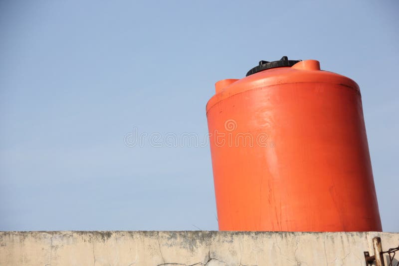 Orange water tower stock photo. Image of flag, wood - 287217318