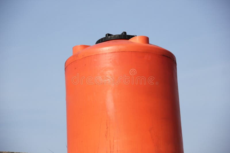 Orange water tower stock photo. Image of lighting, background - 287217342