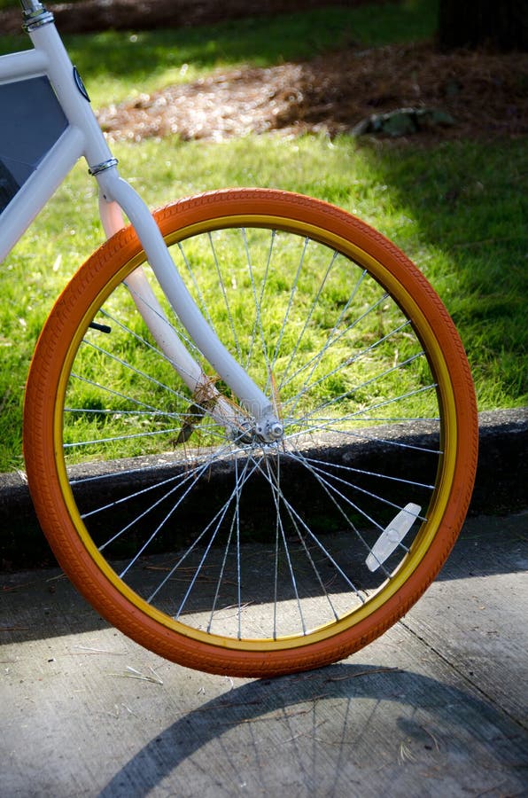 Orange wheel of a bicycle stock image. Image of symmetry - 34463207