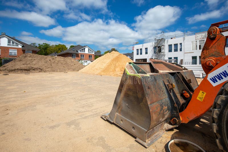 Orange Wheel Loader is on a Construction Site Editorial Stock Photo ...