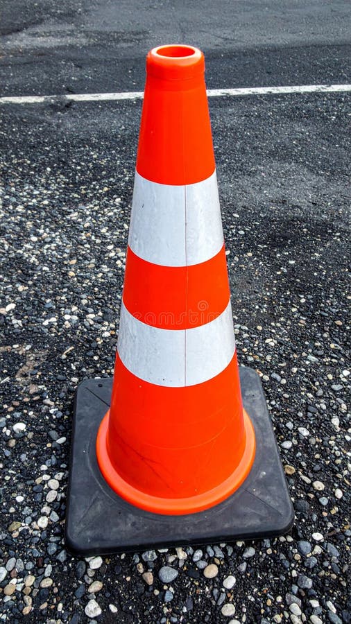 Orange and White Traffic Cone on Asphalt Road Stock Illustration ...