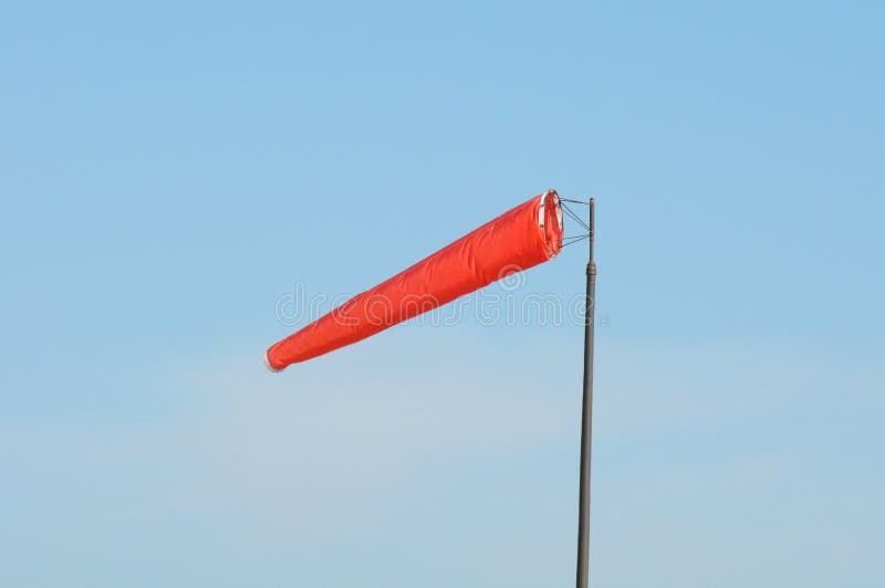 Orange Windsock Against Blue Sky Stock Photo - Image of bright, wind ...