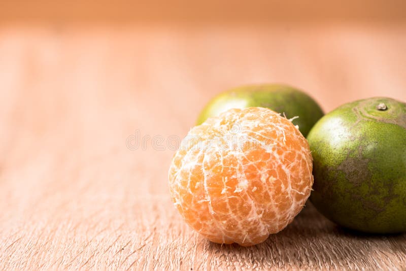 Orange on wood table stock image. Image of orange, tables - 65609171