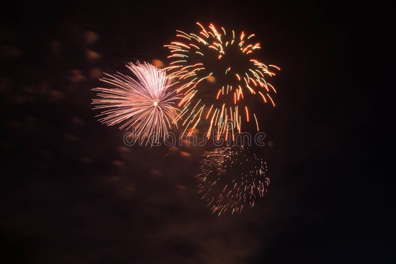 Orange and Yellow Fireworks in the Dark Sky Stock Image - Image of ...