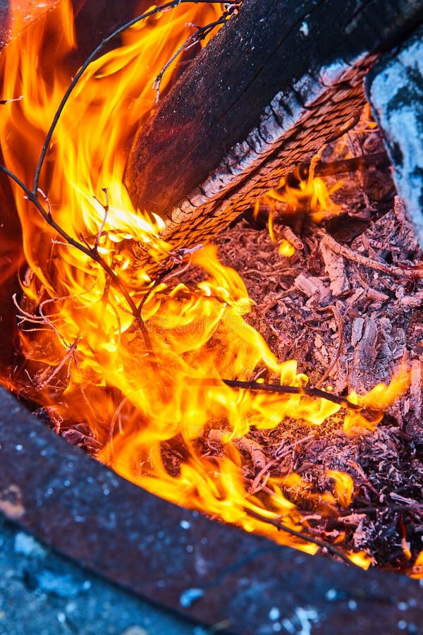 Orange and Yellow Flames in Fire Pit with White Ashen Log and Ground ...