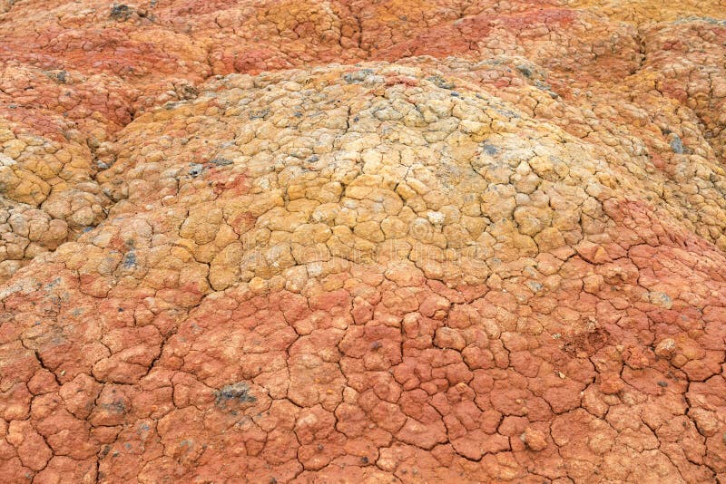 Sludge Pit with Hills and Orange Soil, Contaminated Land with ...