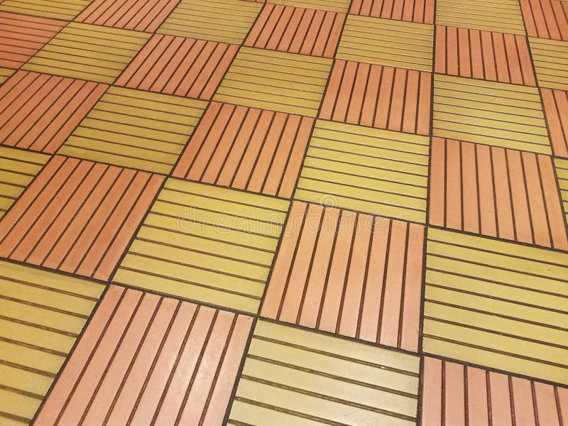 Orange and Yellow Square Tiles on Floor Stock Image - Image of tiles ...