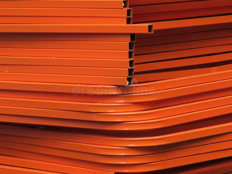 Orangery: Stacked Ornage Colored Metal Fences Stock Image - Image of ...