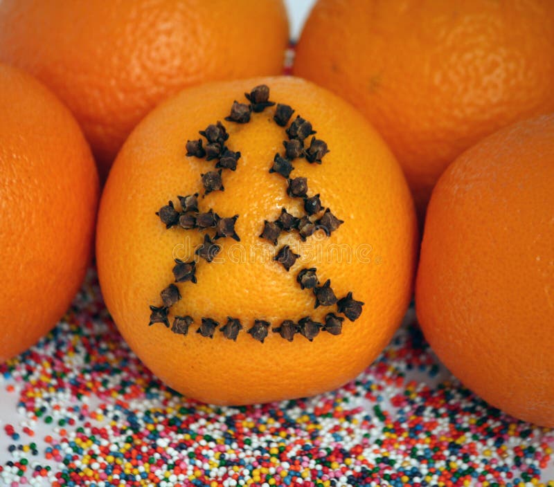Oranges with cloves stock image. Image of holidays, christmas - 34844609