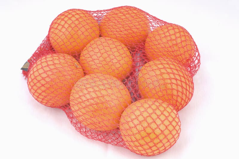 Oranges in a net stock image. Image of closeup, foods - 3516681