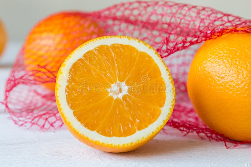 Oranges on the net stock image. Image of vitality, organic - 34675803