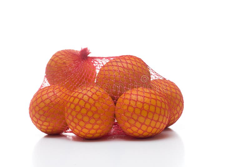 Oranges in netting stock photo. Image of fresh, background - 9673214