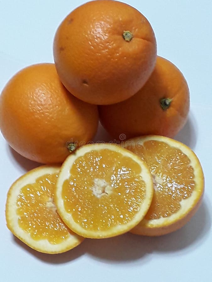 Oranges and Pieces on the White Board Stock Image - Image of white ...