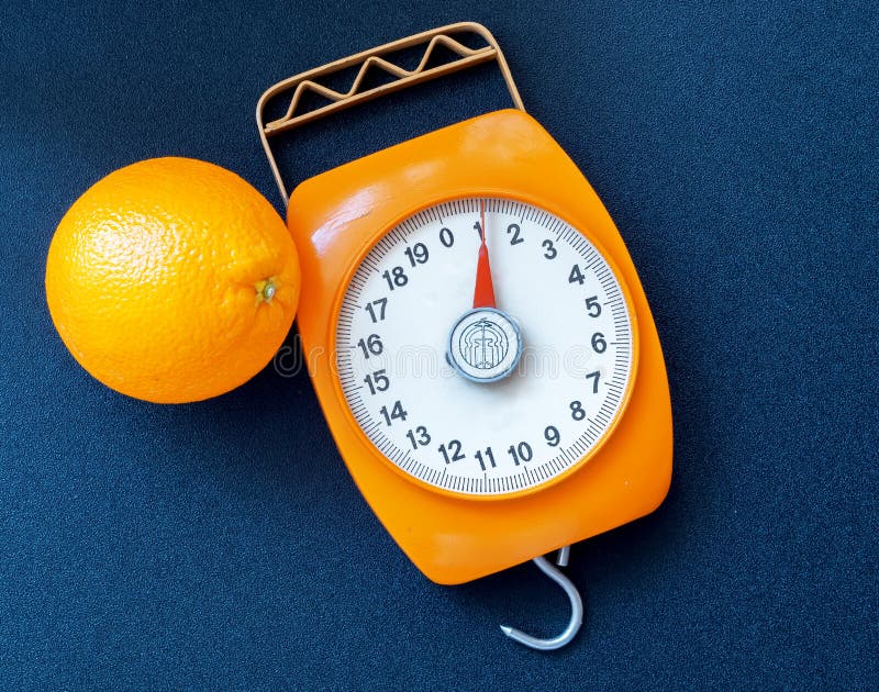 Oranges and scales stock photo. Image of health, citrus - 40166358