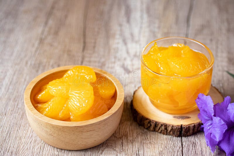 Oranges in Syrup in Wooden Cup on Wooden Background Stock Photo - Image ...