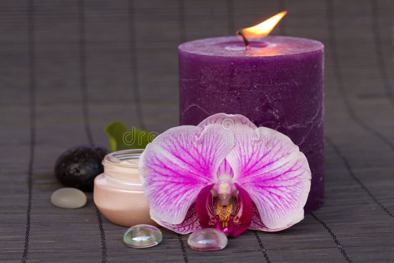 Spa set with purple orchid stock photo. Image of treatment - 34385570