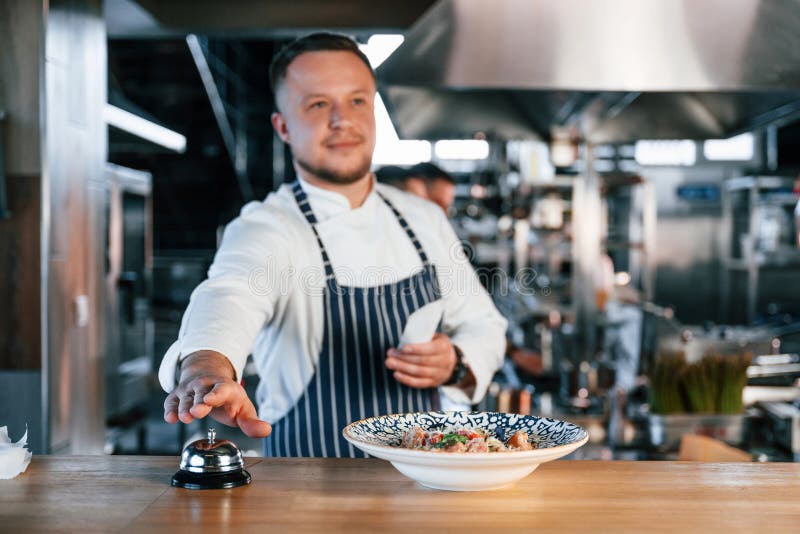 Order is Complete. Kitchen Workers is Together Preparing the Food Stock ...
