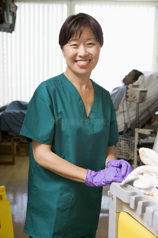 An Orderly Mopping the Floor in a Hospital Stock Image - Image of ...