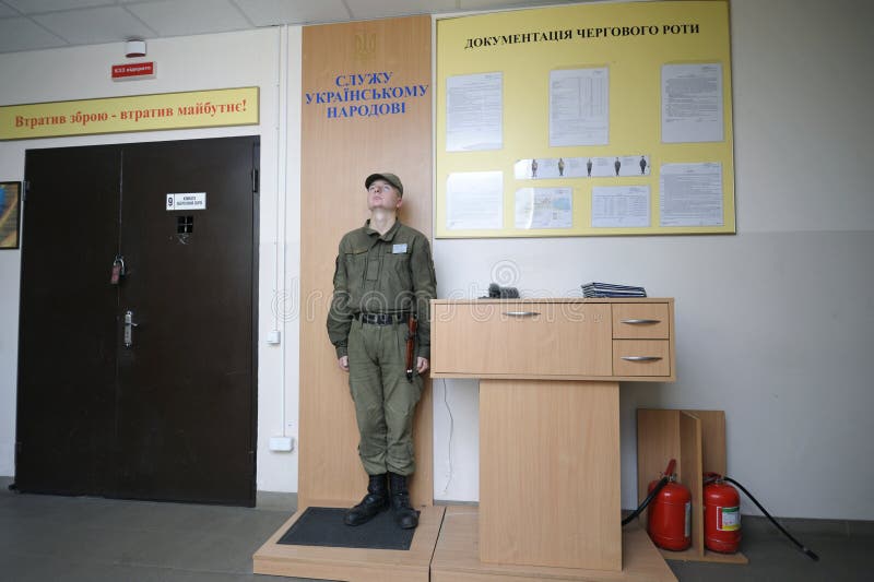 Orderly Man Standing at Attention at a Corridor of Barrack Editorial ...
