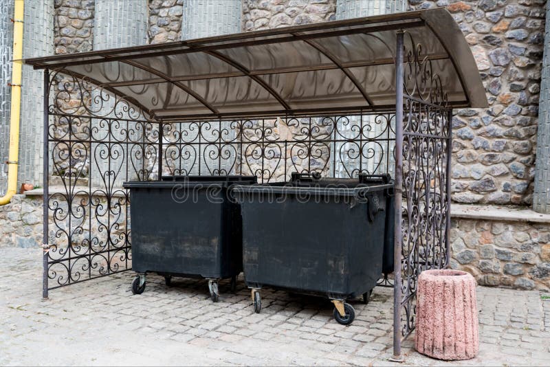 Orderly Stowed Garbage Cans for Separate Garbage Collection Standing ...