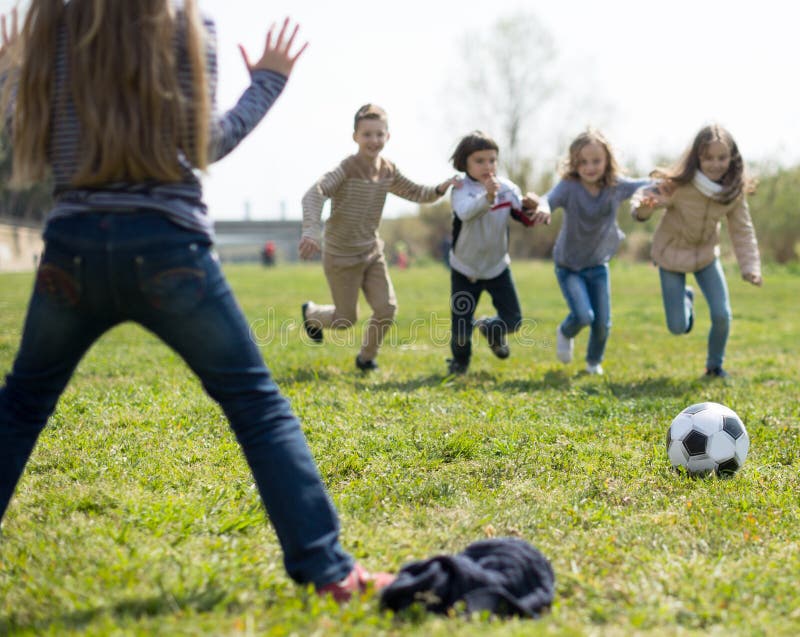 Children Play with Ball Outdoors in Spring Stock Photo - Image of ...