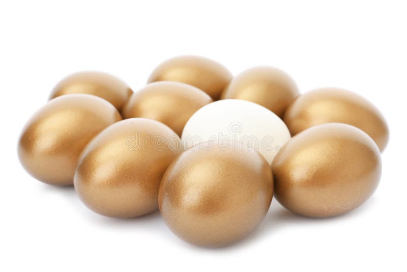 Ordinary Egg among Golden Ones on White Stock Image - Image of ...