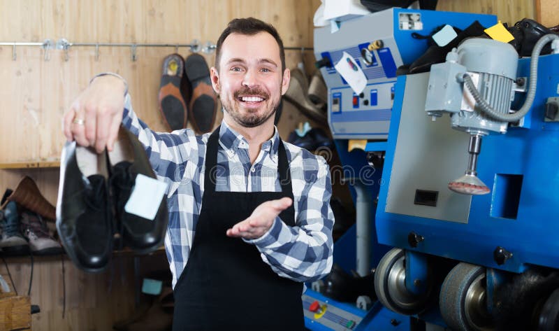 Ordinary Male Worker Showing Fixed Shoes Stock Photo - Image of person ...