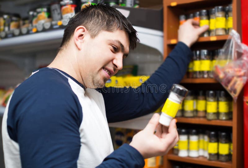 Ordinary Guy Purchasing Spices at Supermarket Stock Image - Image of ...