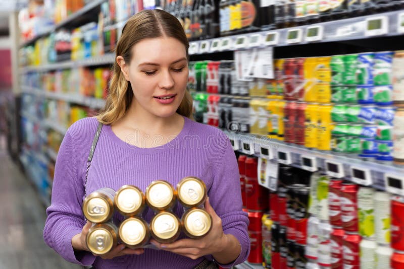 Ordinary Positive Female Customer Selecting Beer Stock Photo - Image of ...