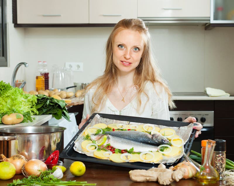 Ordinary Woman Cooking Fish and Potato in Sheet Pan Stock Photo - Image ...