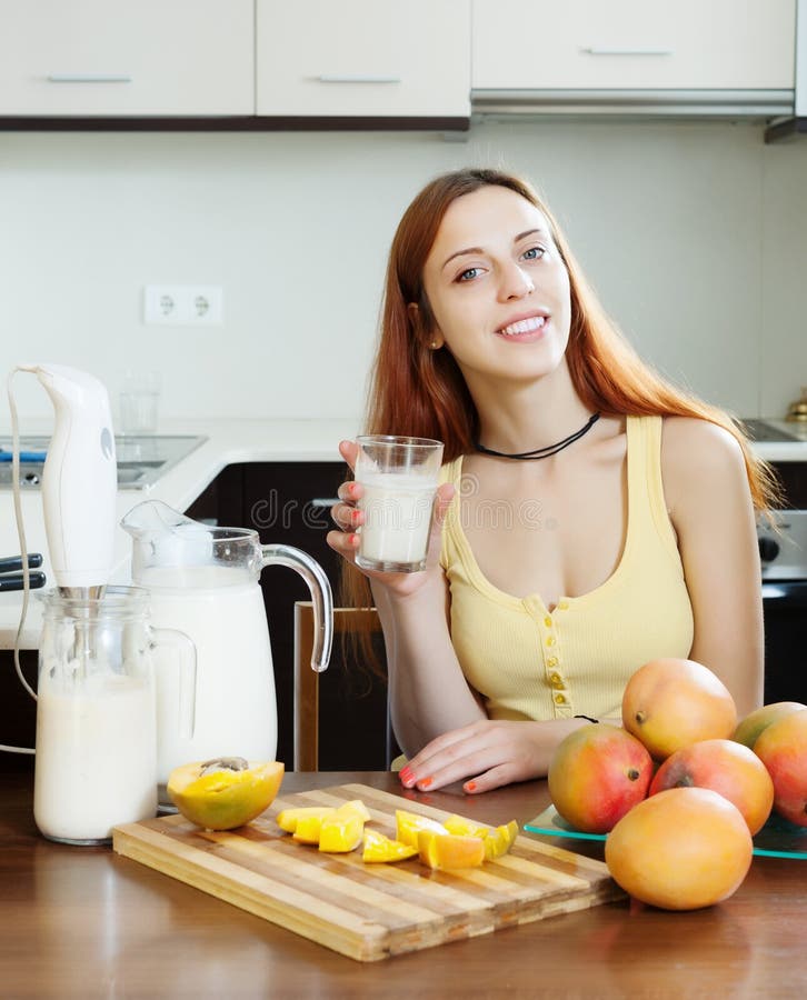 Ordinary Woman Drinking Milkshake with Mango Stock Image - Image of ...