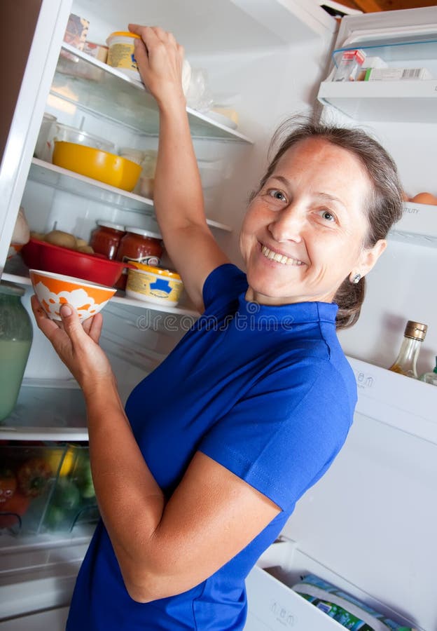 Ordinary Woman Taking Something of the Fridge Stock Photo - Image of ...