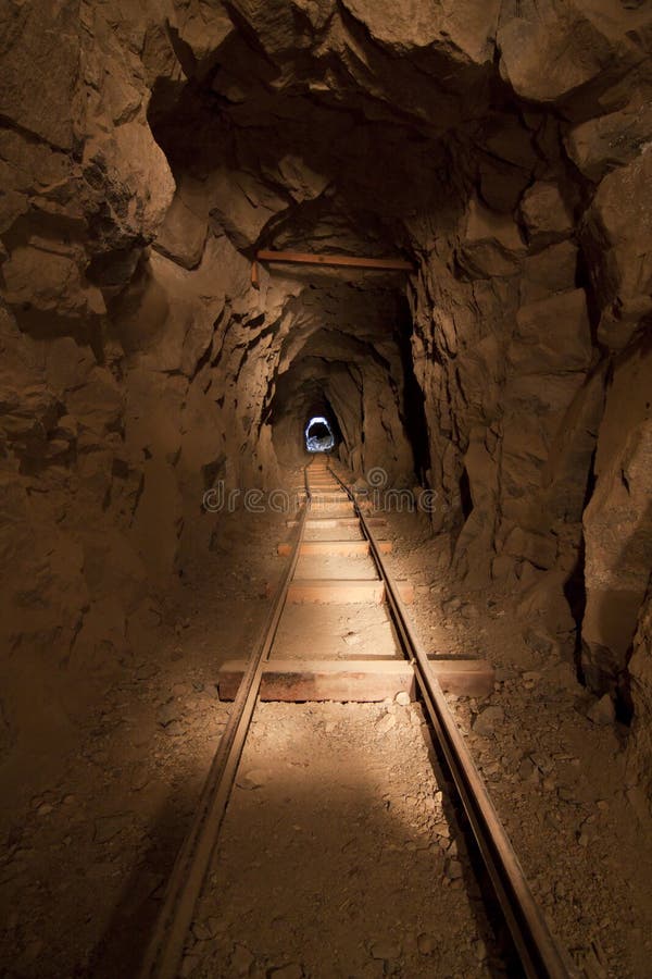 Ore Cart Tracks in Mine stock image. Image of cave, minerals - 23160677