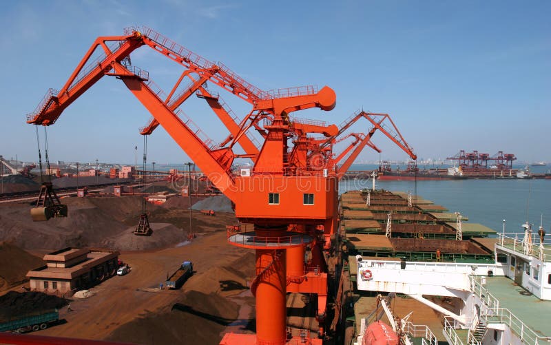 Handling Iron Ore of the Crane Stock Photo - Image of shipping ...