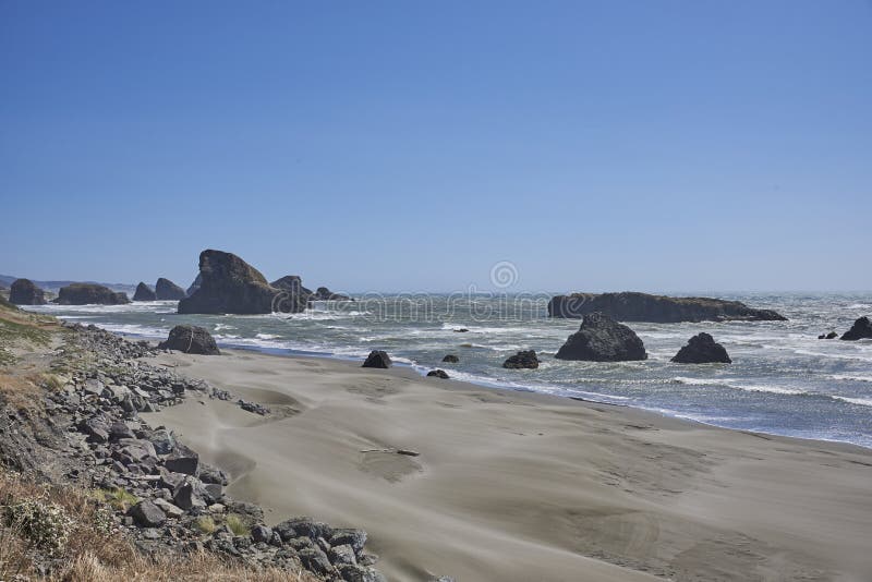 Oregon Beach with Rocks in Stormy Weather Stock Image - Image of wind ...