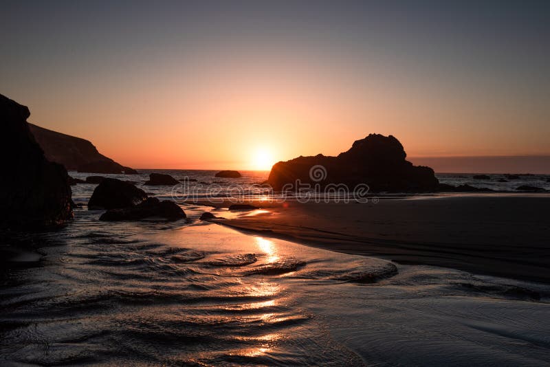 Oregon Sunset Behind Rocks at Harris Beach Stock Image - Image of beach ...