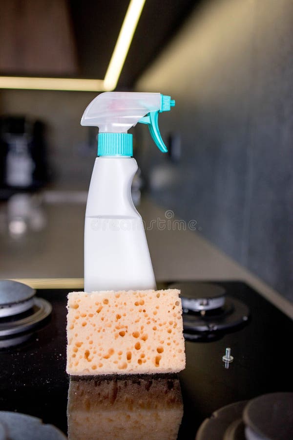 Orenge Sponge and Means of the Cleaning Gas Stove on Kitchen Stock ...