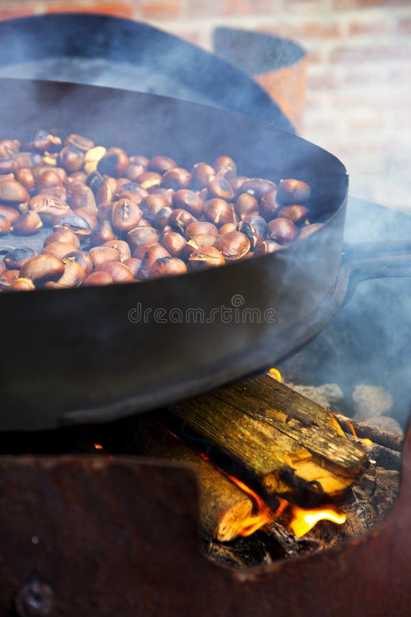 Organic Brown Chestnuts Roasting Over a Hot Fire Stock Image - Image of ...
