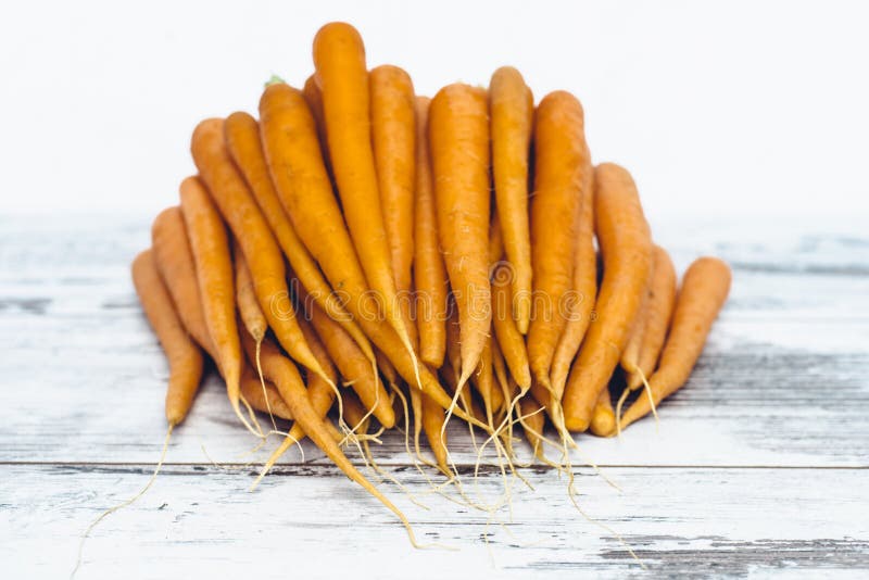 Organic Carrots on Wooden Table Stock Image - Image of organic, table ...