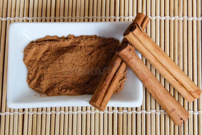 Organic Cinnamon Powder And Sticks Stock Image - Image of spice, dish ...