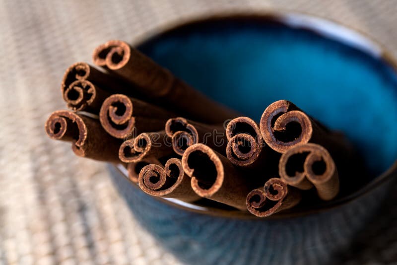 Organic Cinnamon Sticks and a Blue Bowl Stock Image - Image of cooking ...