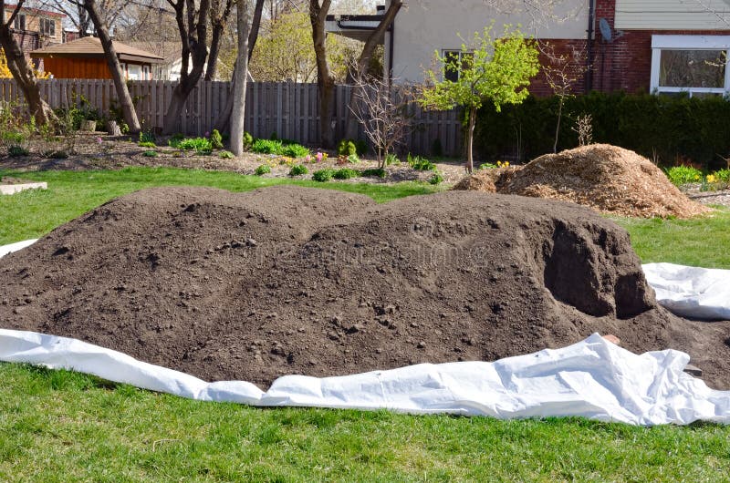 Man unloading compost stock image. Image of mulch, compost - 17657479