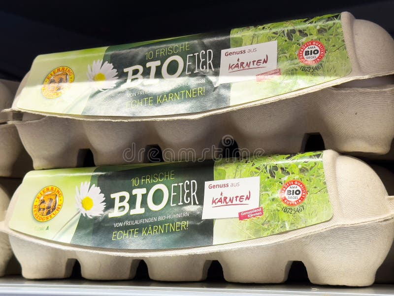 Organic Egg Cartons on Store Shelf with Labels Indicating Freshness and ...