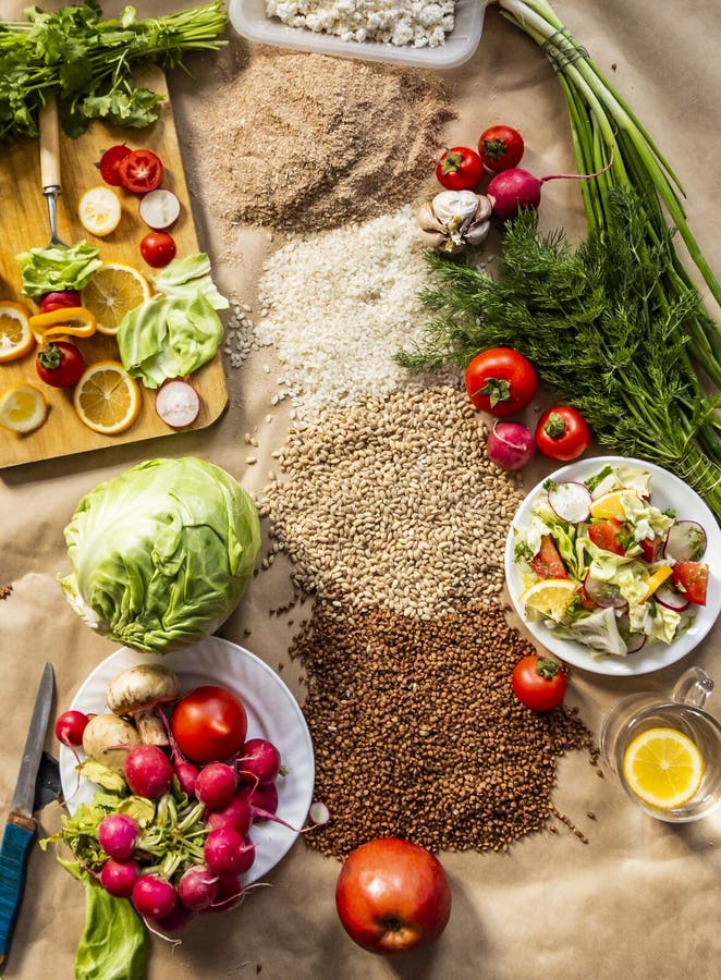 Organic Food Background with Cutting Board and Lemon Slices Stock Photo ...