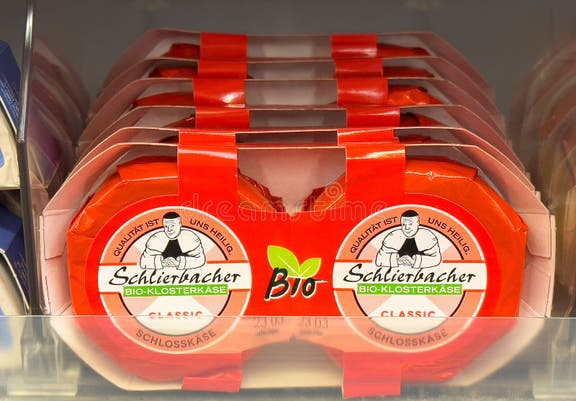 Organic German Cheese Packages with Red Packaging on Display in Store ...